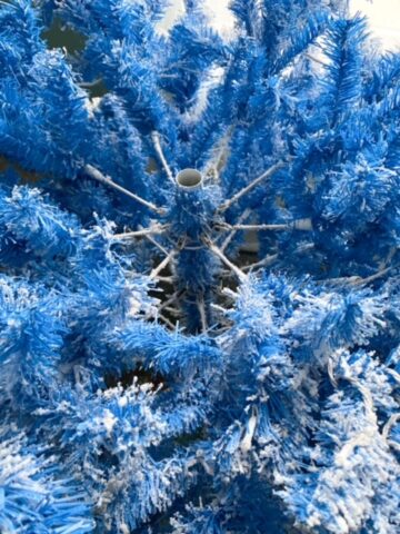 How To Add Ribbon To Decorate A Beautiful Blue Flocked Christmas Tree