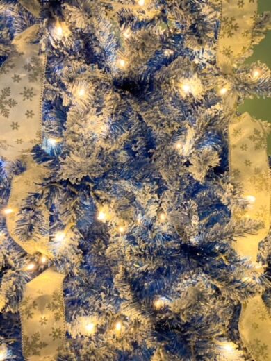 How To Add Ribbon To Decorate A Beautiful Blue Flocked Christmas Tree
