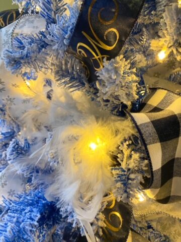 How To Add Ribbon To Decorate A Beautiful Blue Flocked Christmas Tree