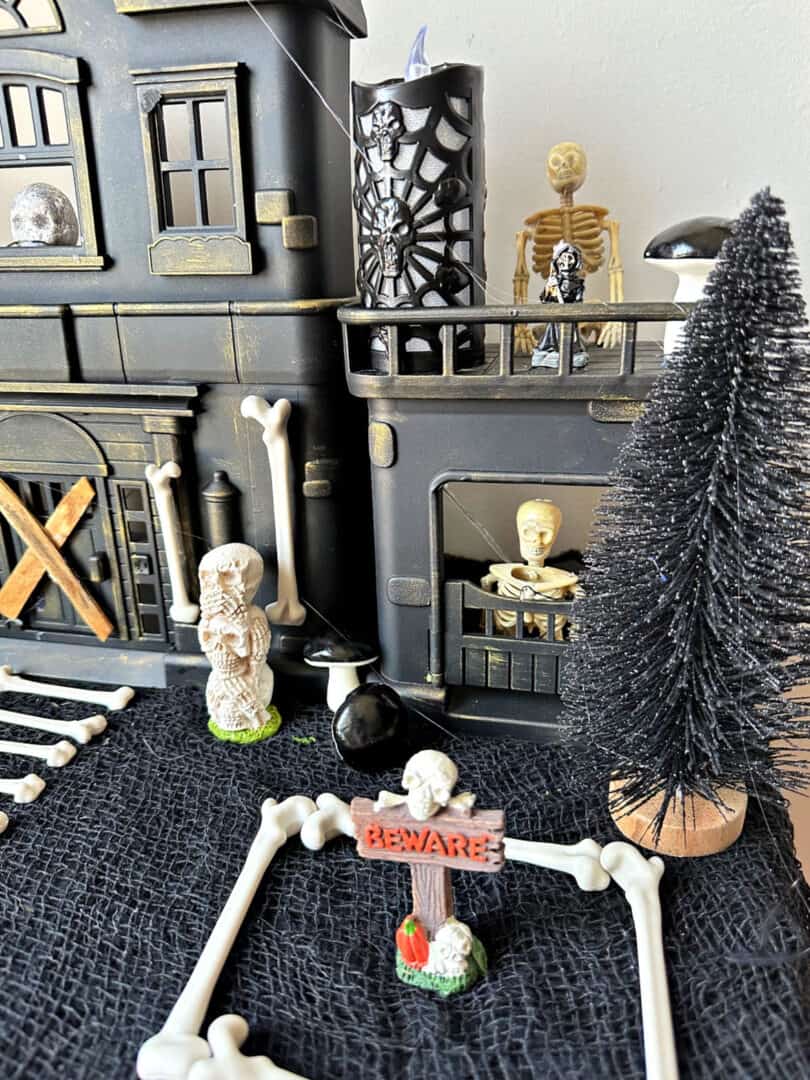How to Make a Spooky DIY Haunted House From A $3 Dollhouse